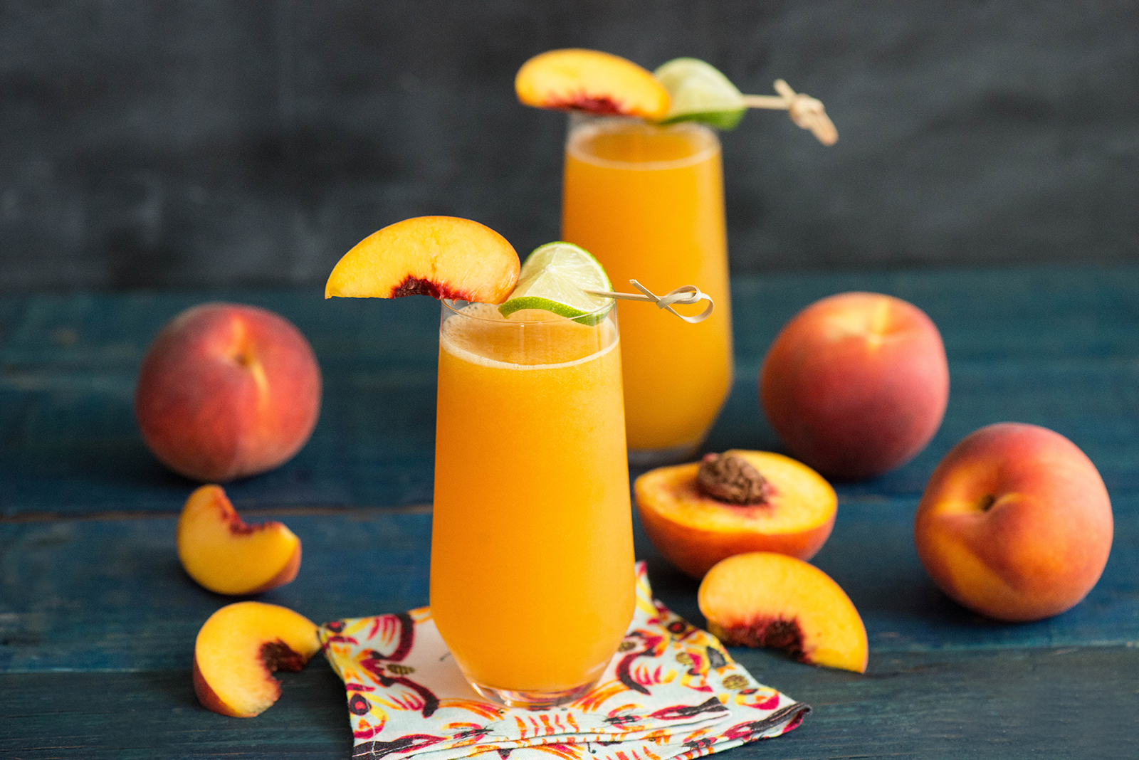Fizzy Peach Bellini Mocktail - Nibbles and Feasts
